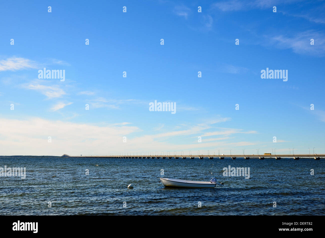 Small rowing boat in front of the Oland bridge in Sweden Stock Photo ...