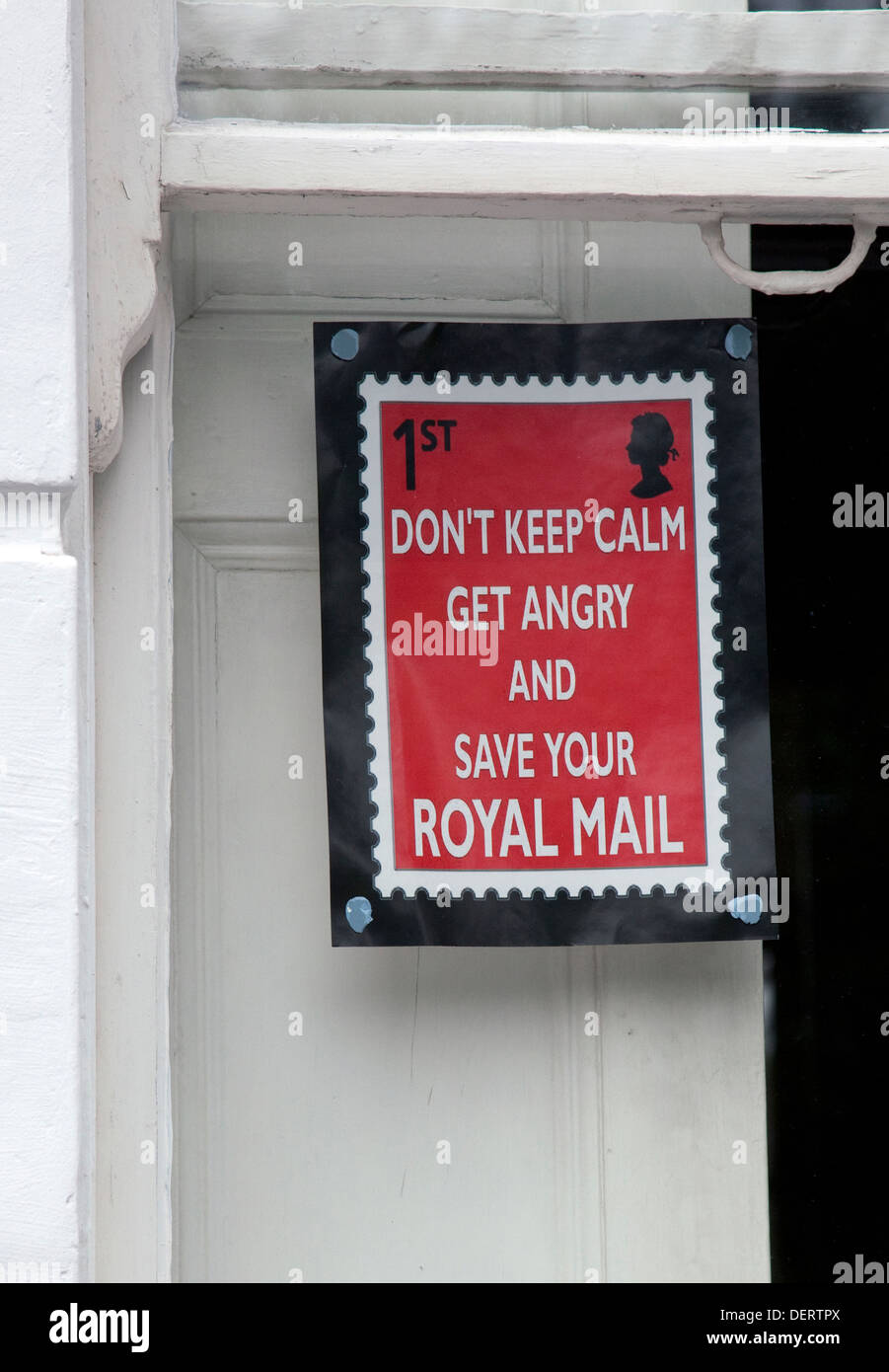 Anti Royal Mail privatisation poster in window of house in London Stock ...