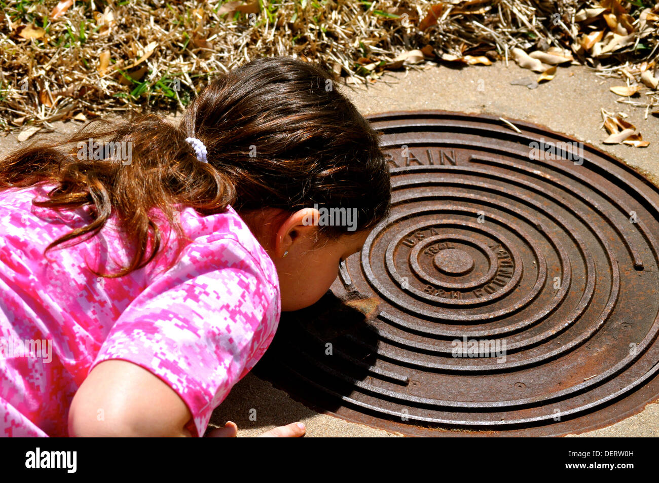 Looking Down a Manhole Stock Photo - Alamy