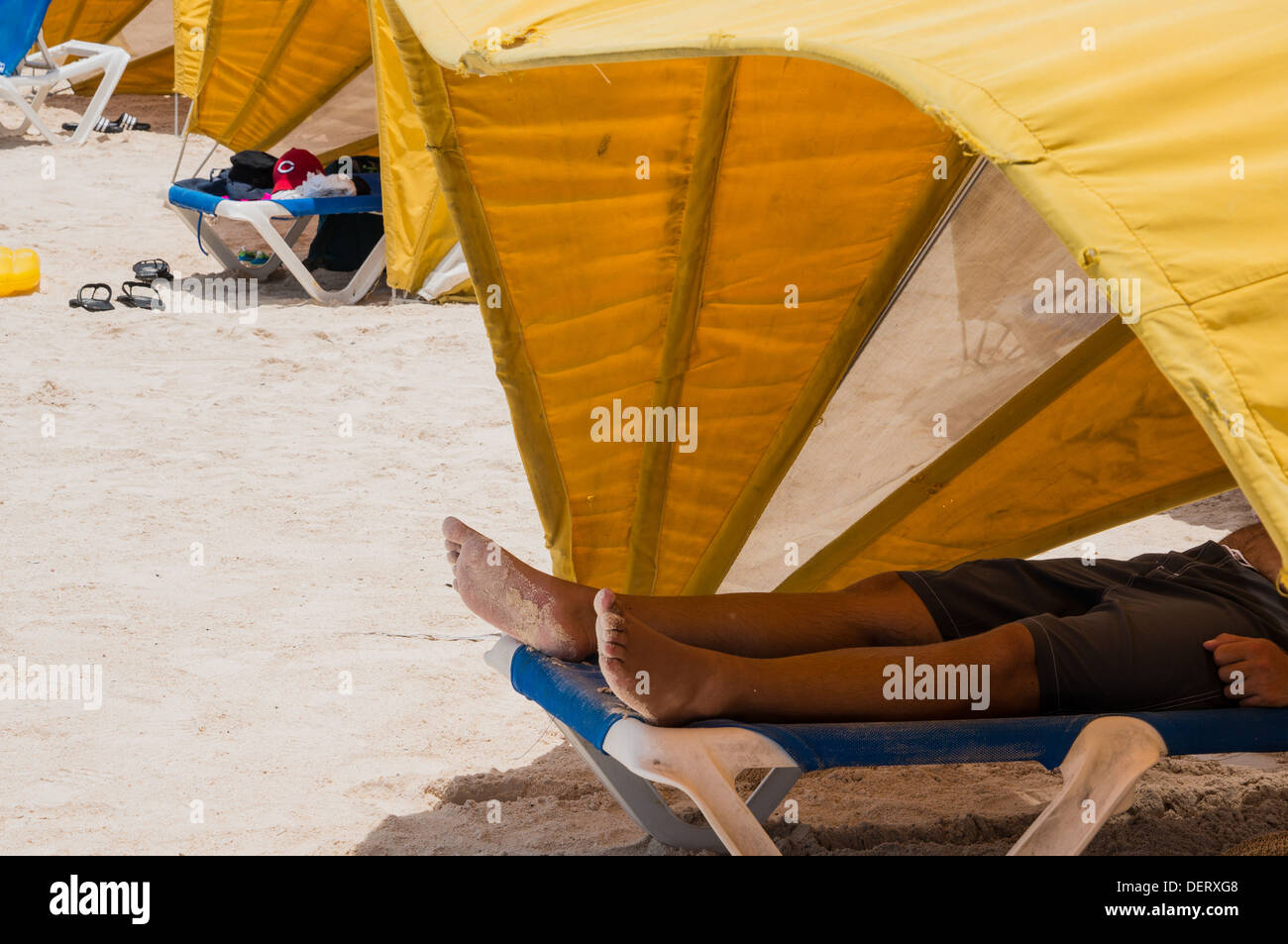 sun tents on Baby Beach in Aruba Stock Photo - Alamy