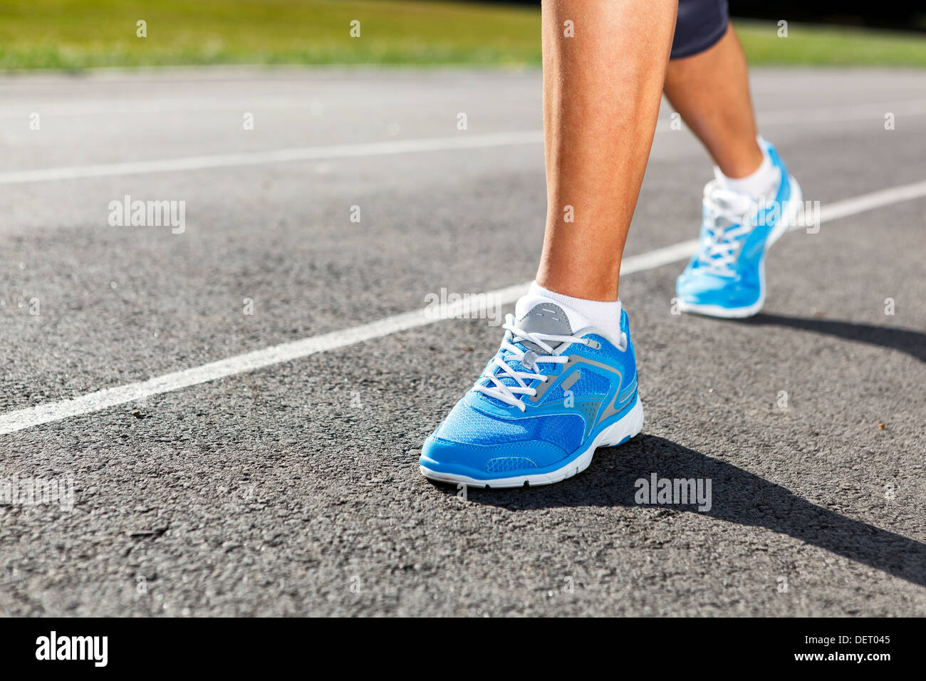 Runner Feet Running on Stadium Closeup - outdoor shot Stock Photo - Alamy