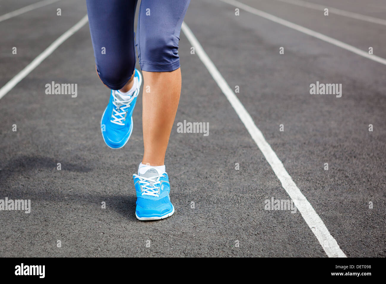 Runner Feet Running on Stadium Closeup - outdoor shot Stock Photo - Alamy
