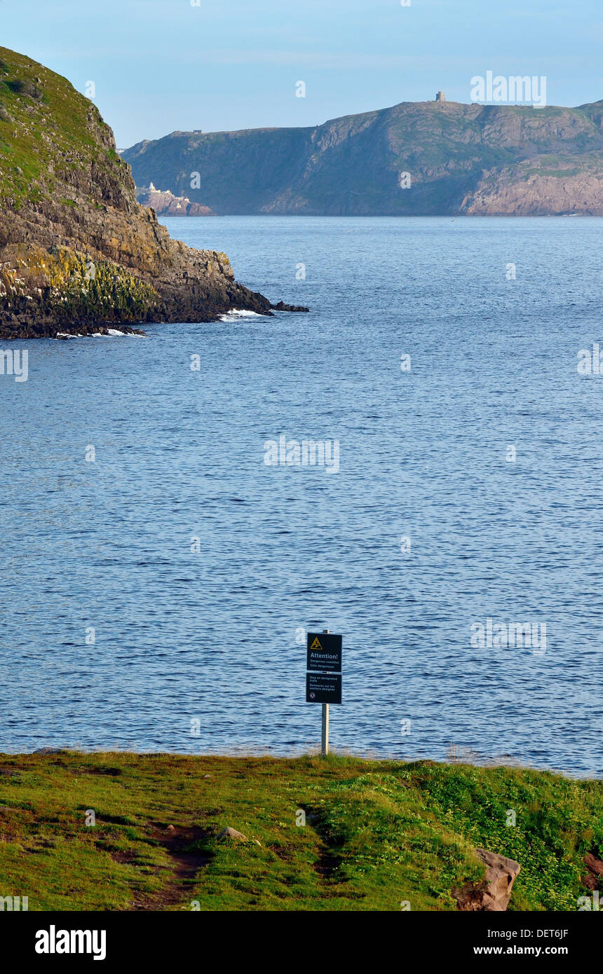 Dangerous coastline warning sign near Cape Spear Newfoundland Stock ...