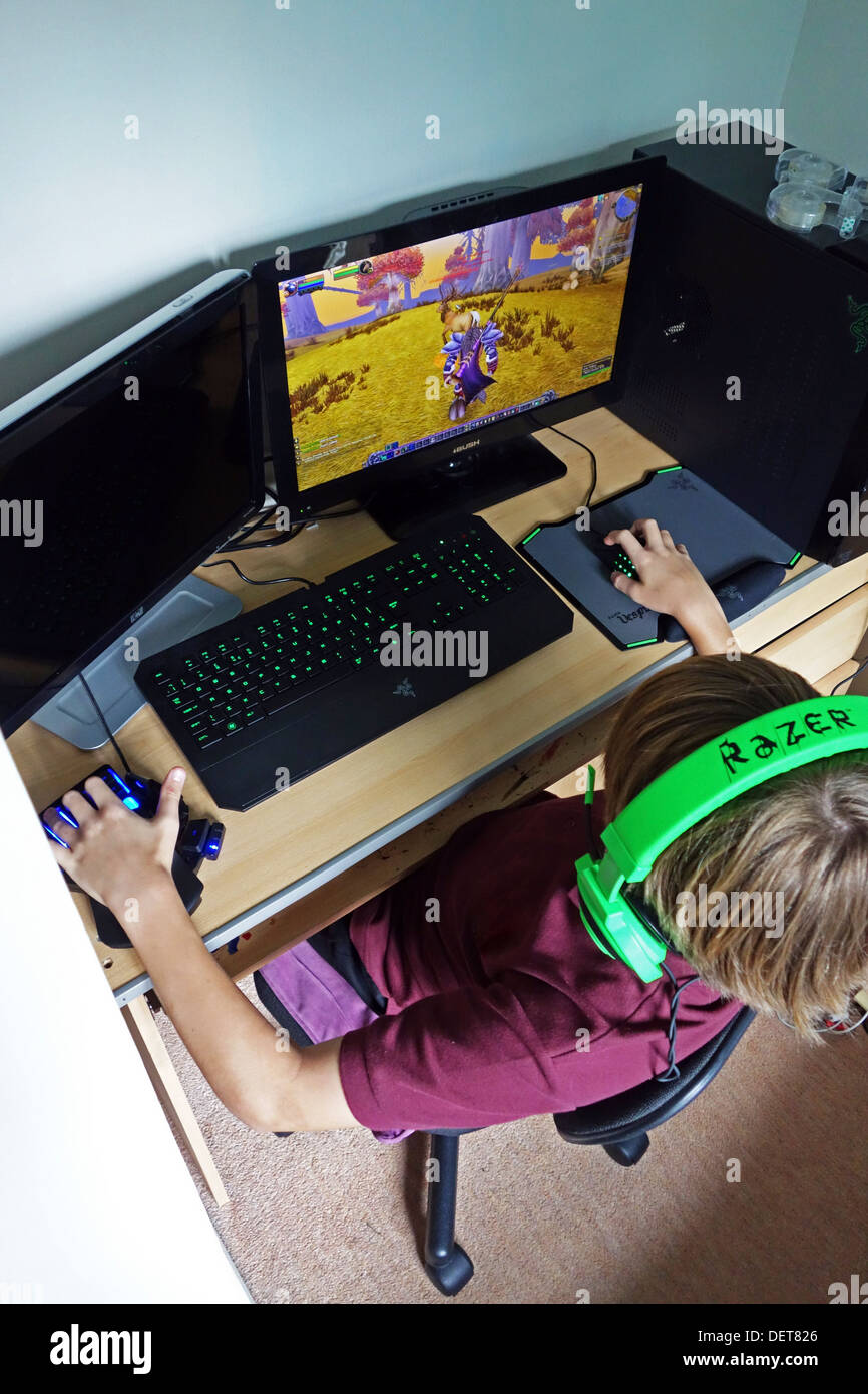 teenage boy playing computer games Stock Photo - Alamy