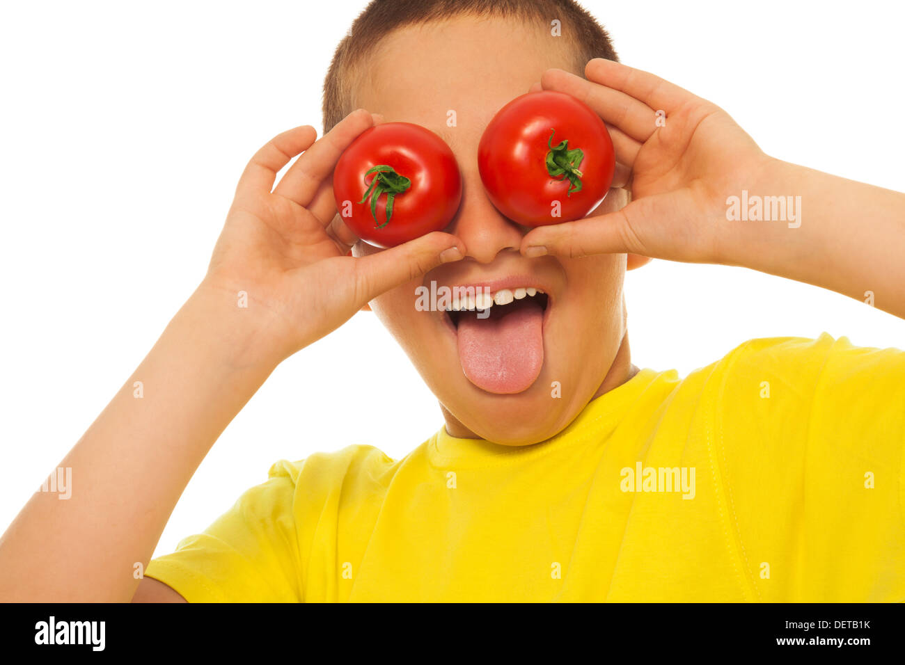 Portrait of funny little boy making face expression holding couple ...