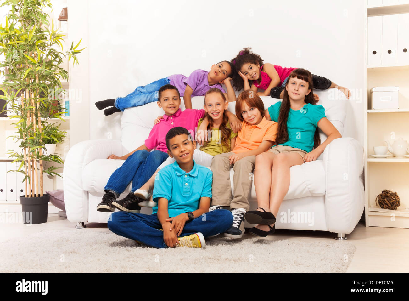 Close portrait of group of seven kids, boys and girls of school age ...