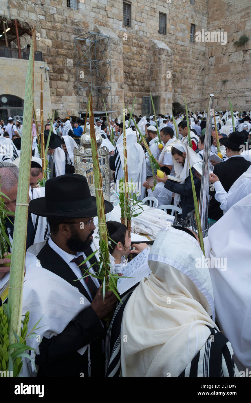 Jews praying with Lulav during the Sukkot Jewish festival. Western Wall ...