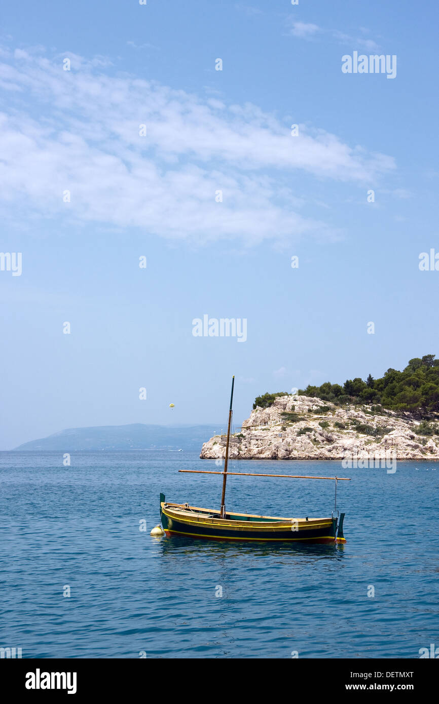 Fishing Boat with a mast in sea Stock Photo - Alamy