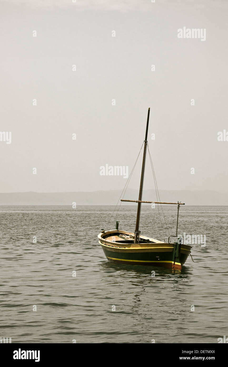 Fishing boat with a mast in sea Stock Photo - Alamy