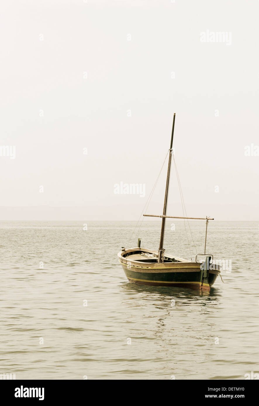 Fishing boat sailing in lake hi-res stock photography and images - Alamy