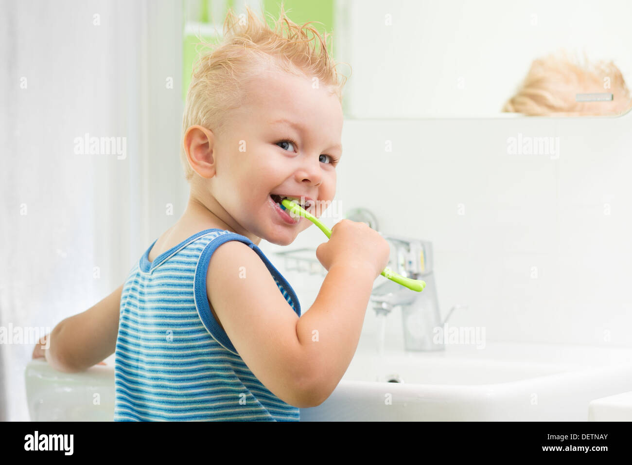 Child in bathroom hi-res stock photography and images - Alamy