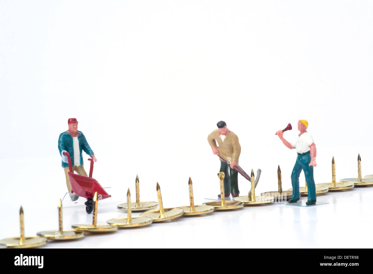 Miniature people teamwork overcoming obstacles business concept Stock ...