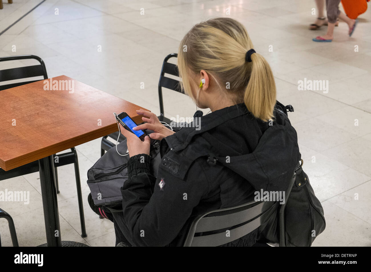 Smart phone text view from behind hi-res stock photography and images ...