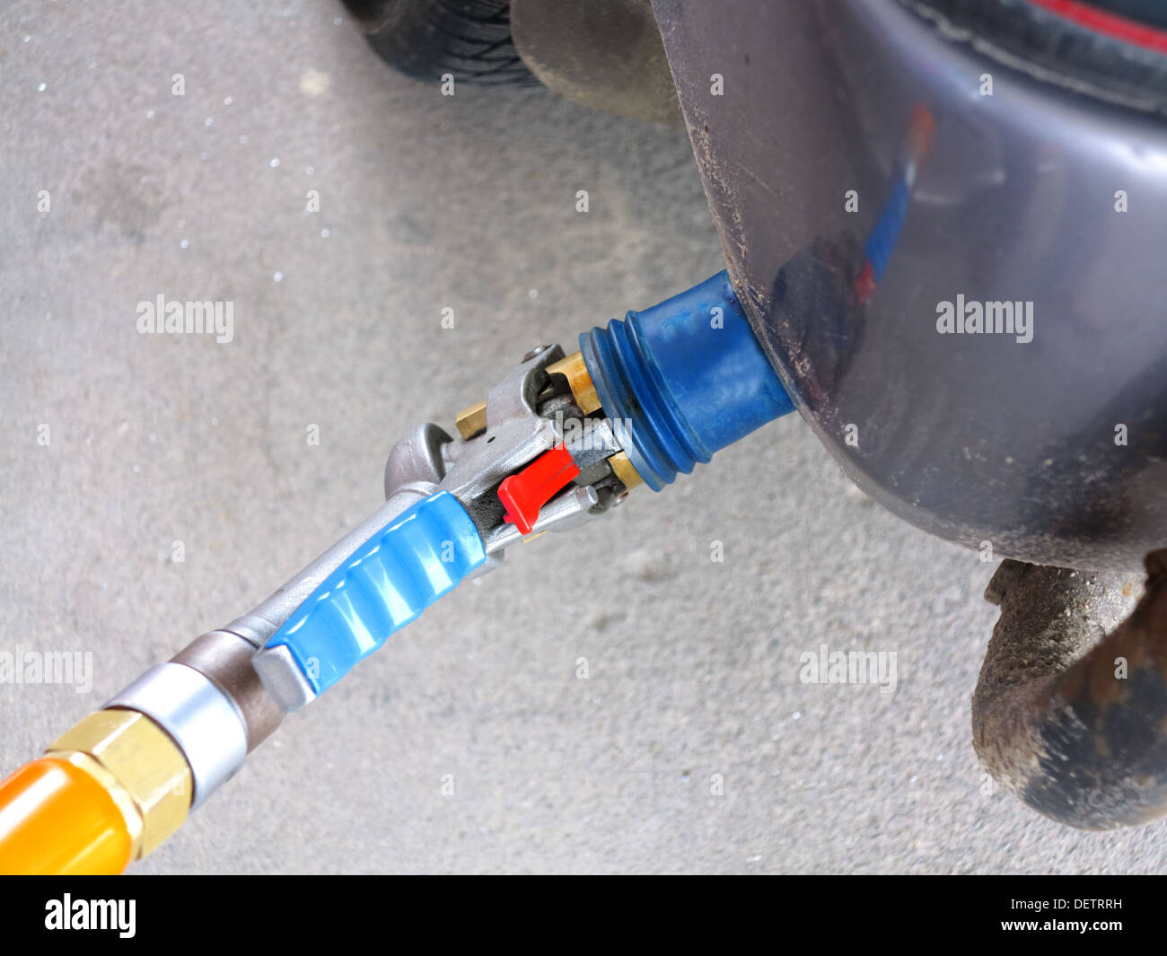 car at gas station being filled with fuel Stock Photo - Alamy