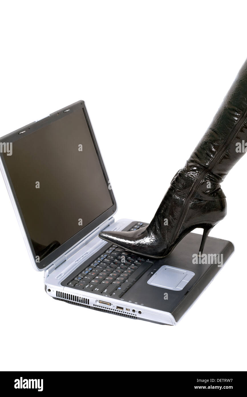 Woman leg over laptop. Isolated on white Stock Photo - Alamy