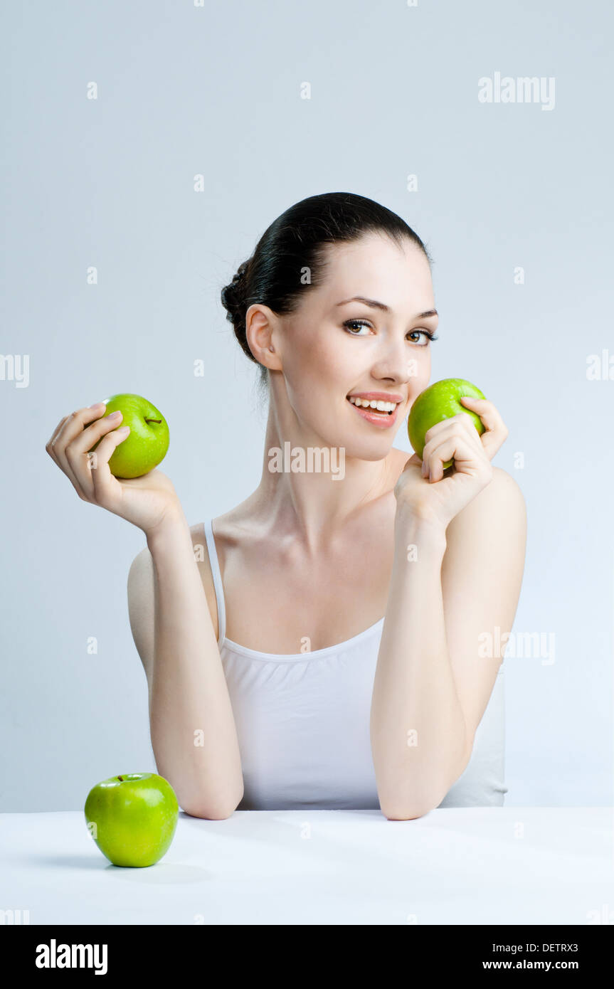 A beautiful slender girl eating healthy food Stock Photo - Alamy