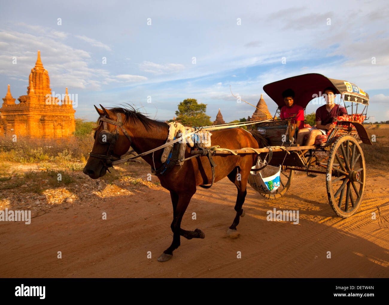 Tourist rides a horse cart in bagan hi-res stock photography and images ...
