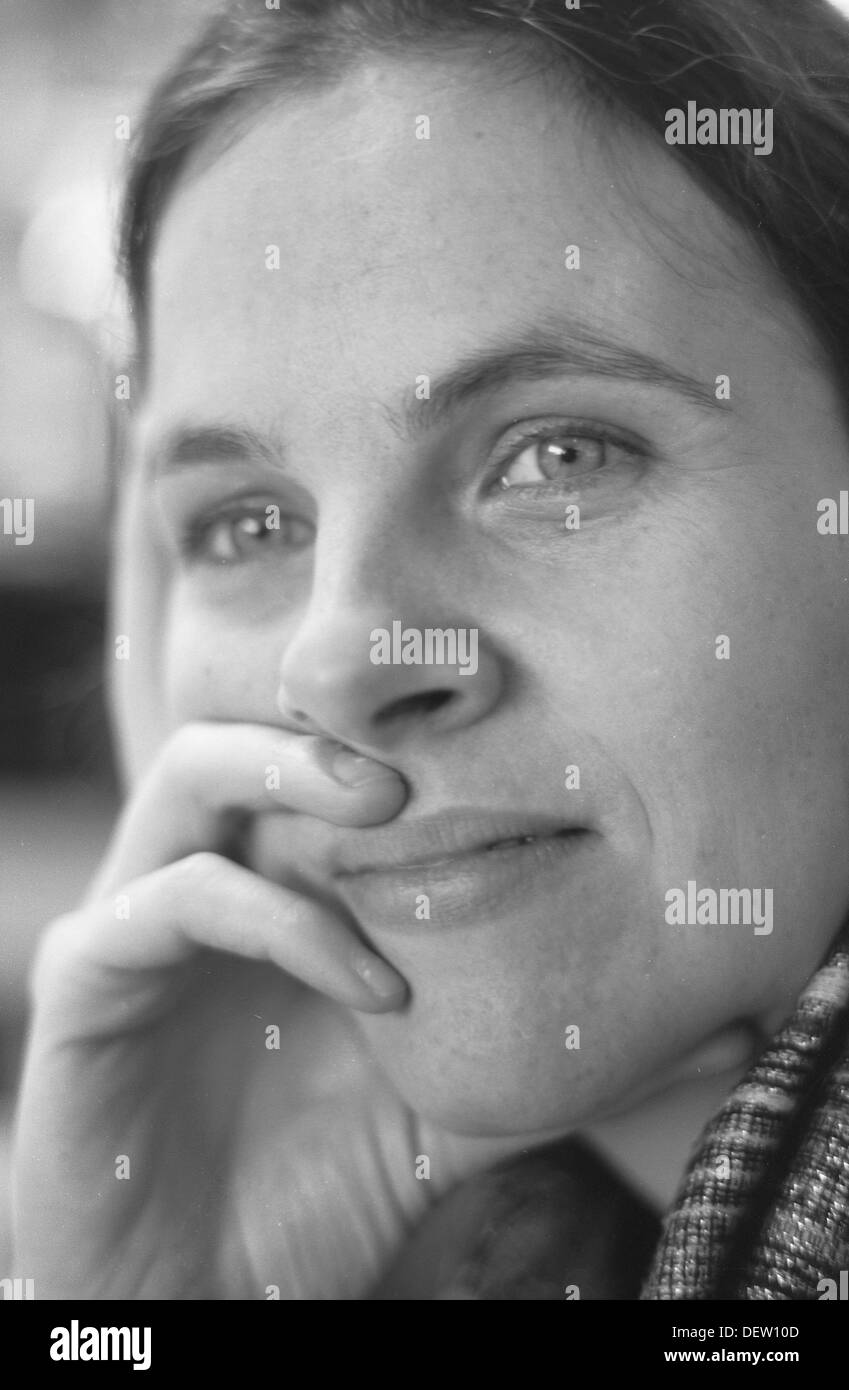 Leaning on hand Black and White Stock Photos & Images - Alamy