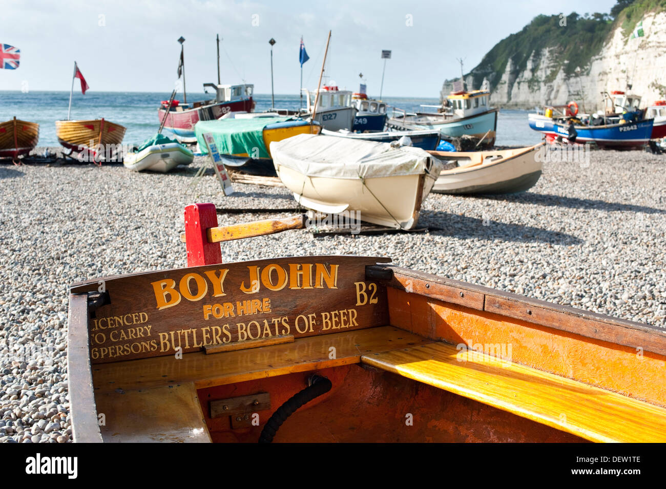 Fishing boats on beach at Beer Devon England Stock Photo - Alamy