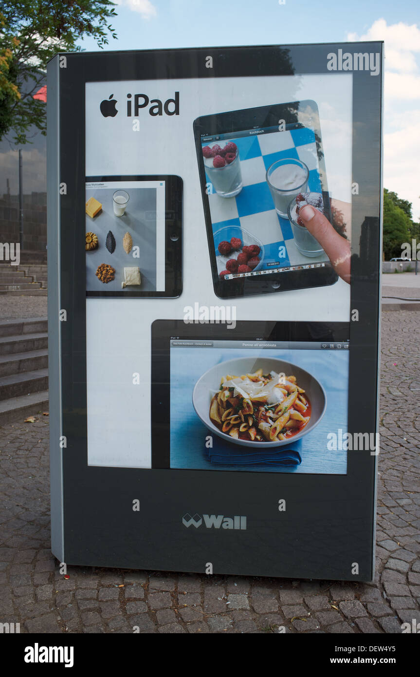 Rolling advertising board displaying an Apple iPad tablet computer ...