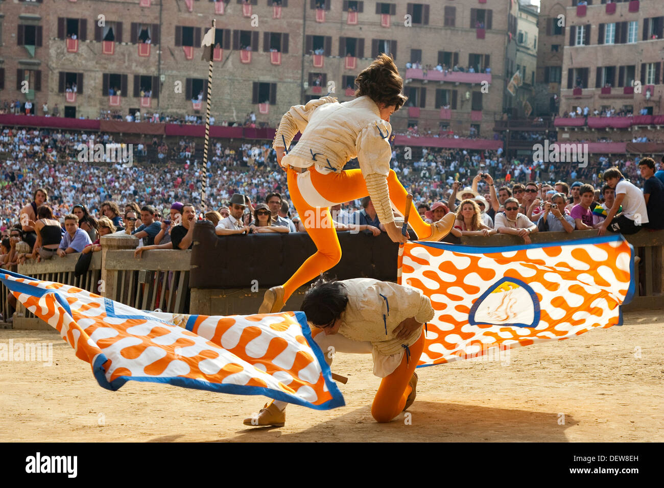 flag wavers, contrada of the unicorn, palio of siena, siena, tuscany ...