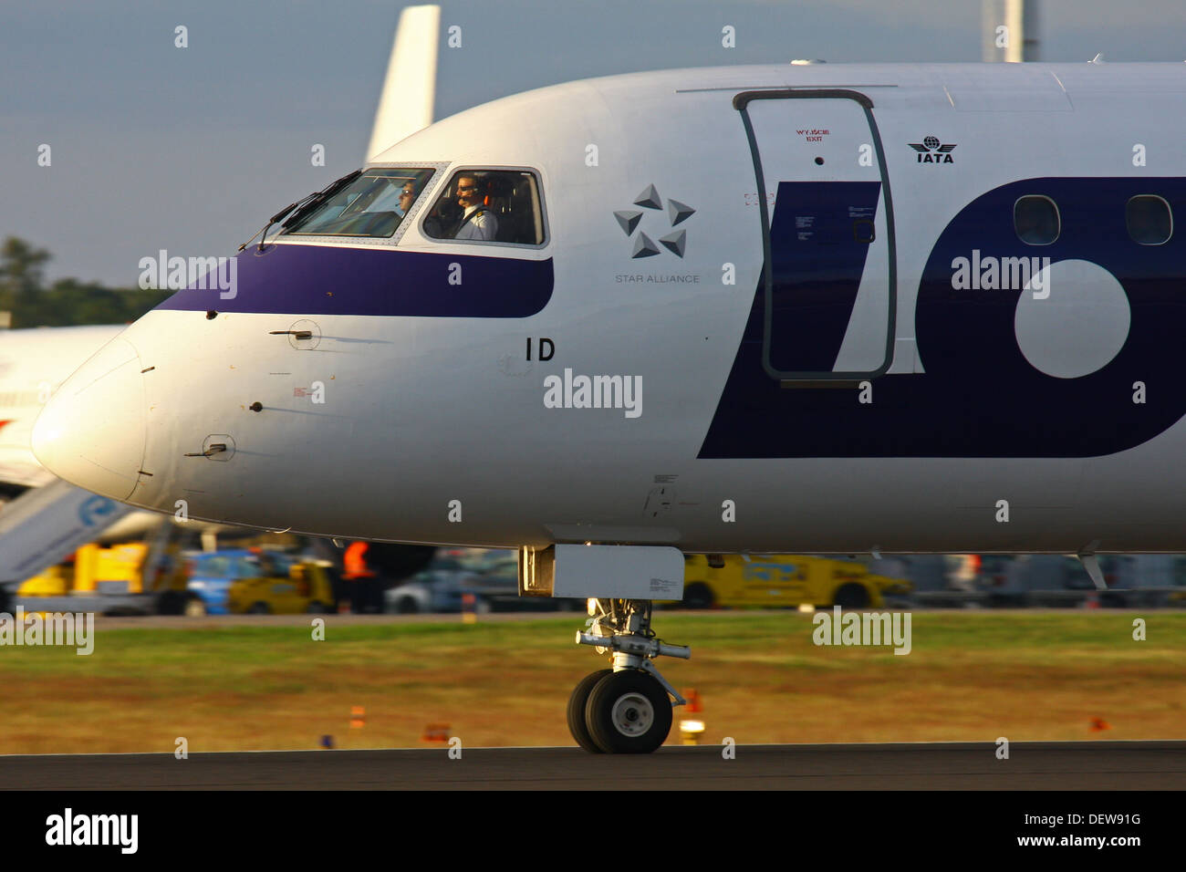 Nose view of Embraer from Lot airlines Stock Photo - Alamy