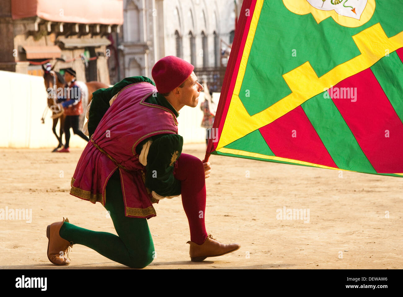 flag wavers, contrada of the dragon, palio of siena, siena, tuscany ...
