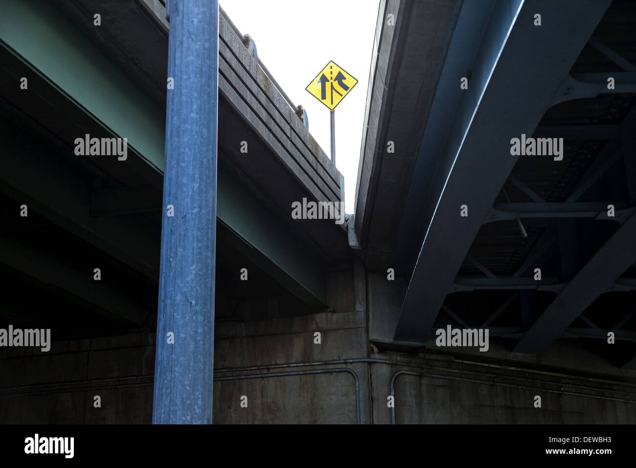 Traffic sign two arrows pointing hi-res stock photography and images ...