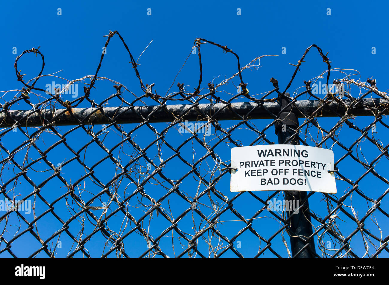 Barbed wire fence and warning sign Newport Rhode Island USA Stock Photo ...