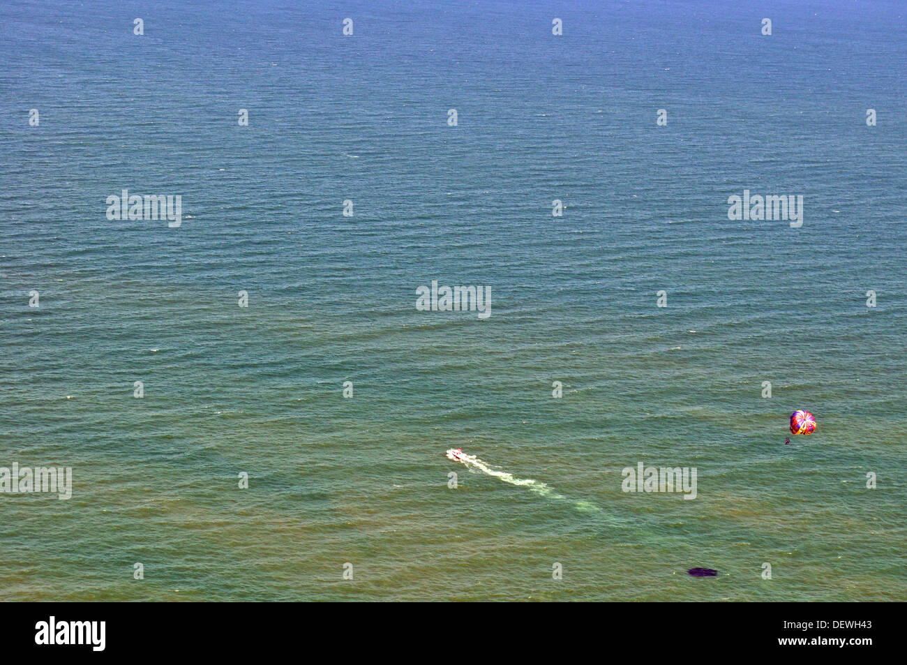 Parasailer on the ocean Stock Photo - Alamy
