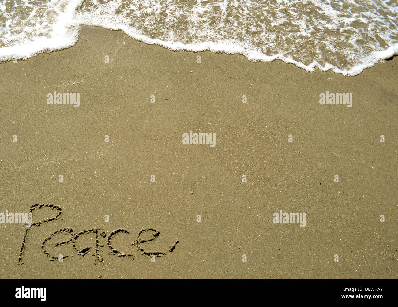 Peace written in the sand Stock Photo - Alamy