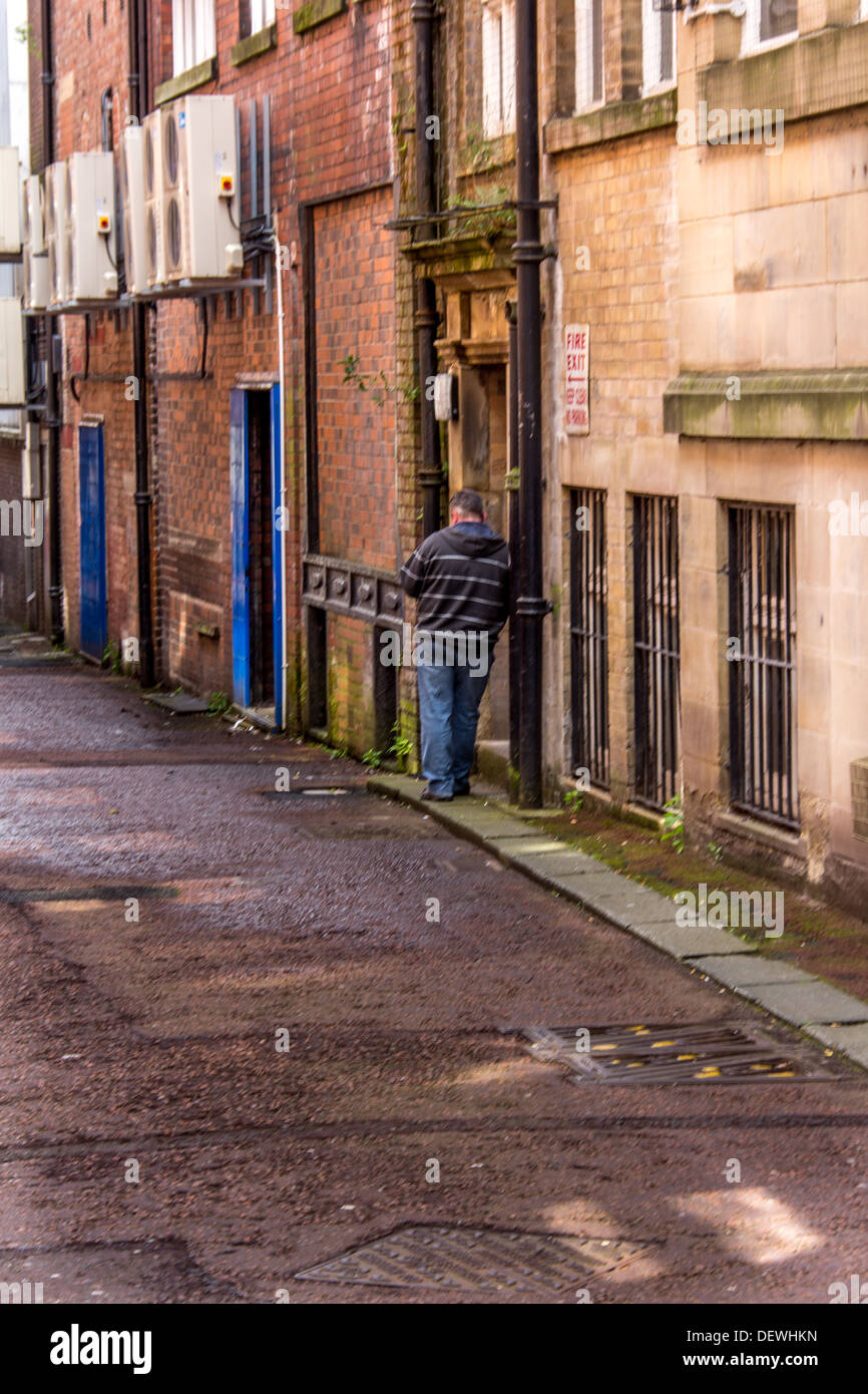 Man walking top wall in hi-res stock photography and images - Alamy