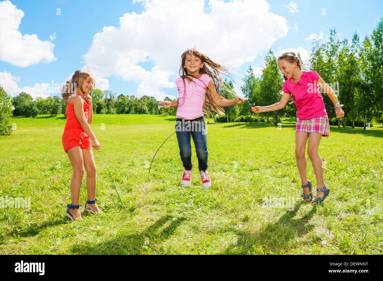 Children skipping rope hi-res stock photography and images - Alamy