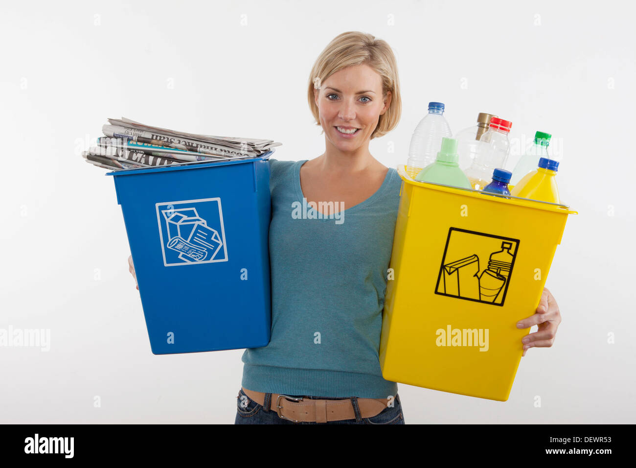 Woman with full recyling bins Stock Photo - Alamy