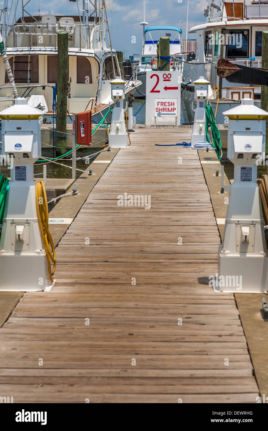 Sign near shrimp boat shows shrimp for sale at the Small Craft Harbor ...