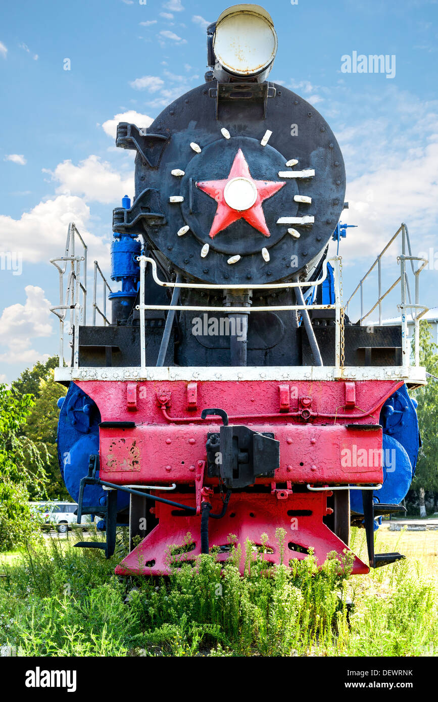 The ancient steam locomotive stands on a pedestal Stock Photo - Alamy
