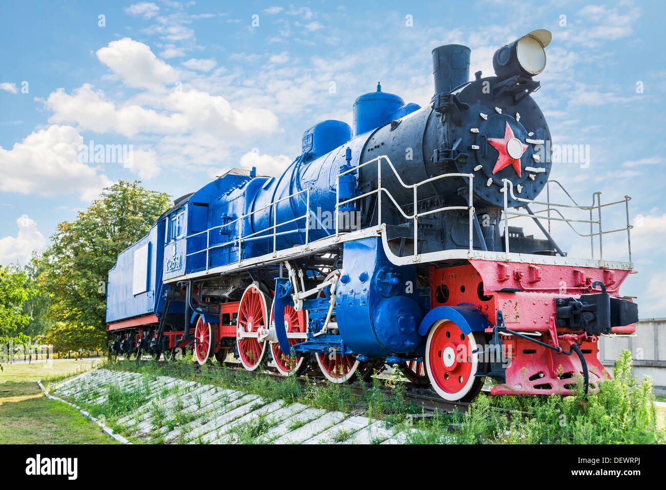 The ancient steam locomotive stands on a pedestal Stock Photo - Alamy