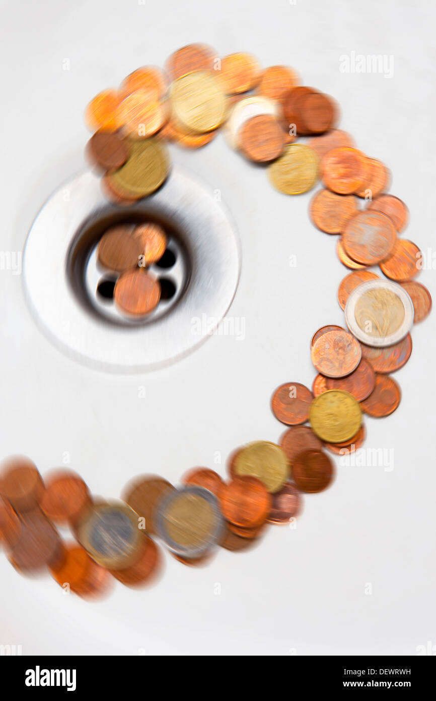Throw money down the drain hi-res stock photography and images - Alamy