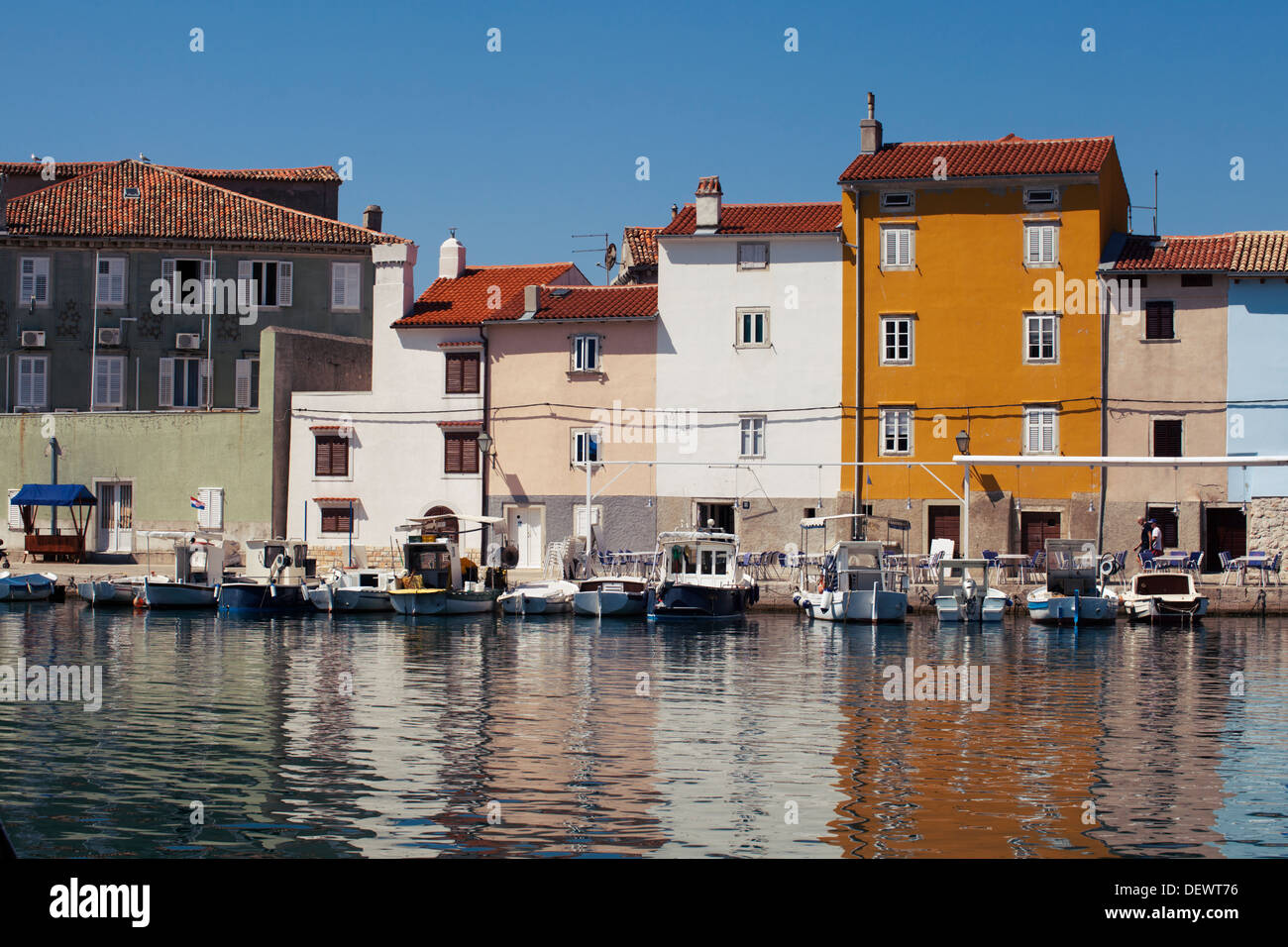 Colorful houses facing the sea at Cres town, Island of Cres, Croatia ...