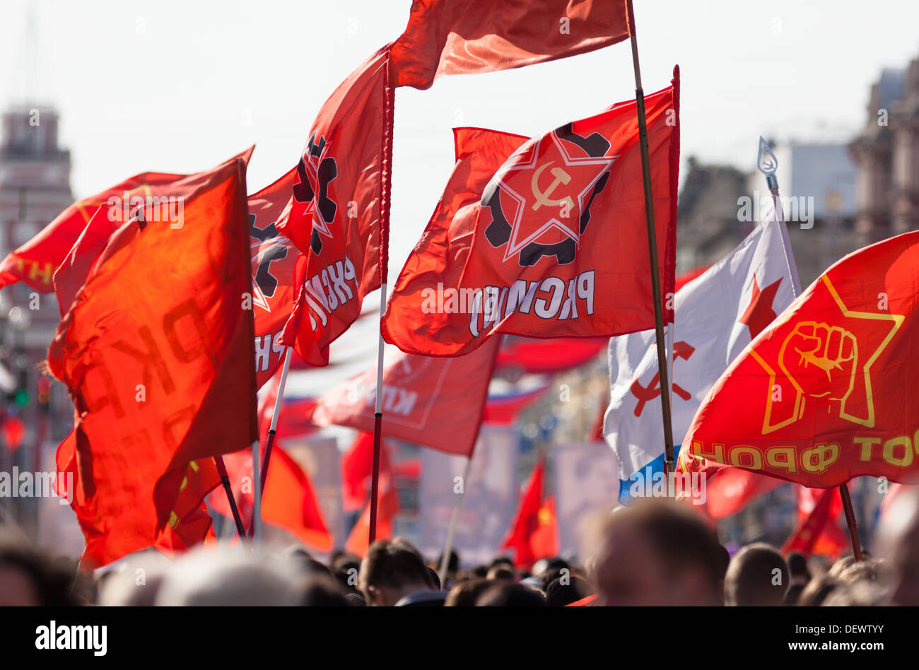 Flags raised fist revolutionary communist hi-res stock photography and ...