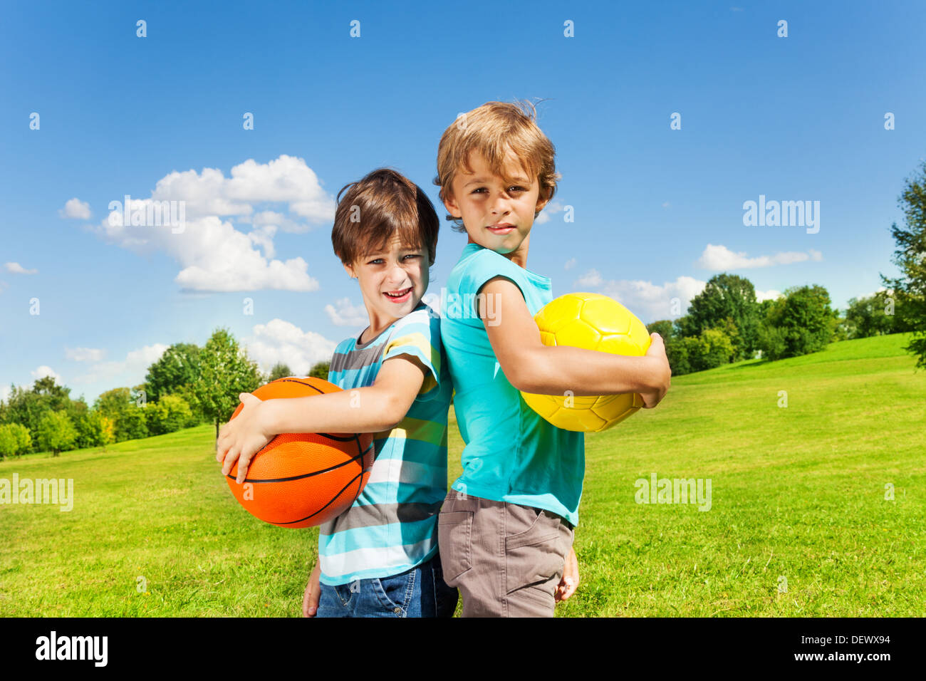 Two children stand outside hi-res stock photography and images - Alamy