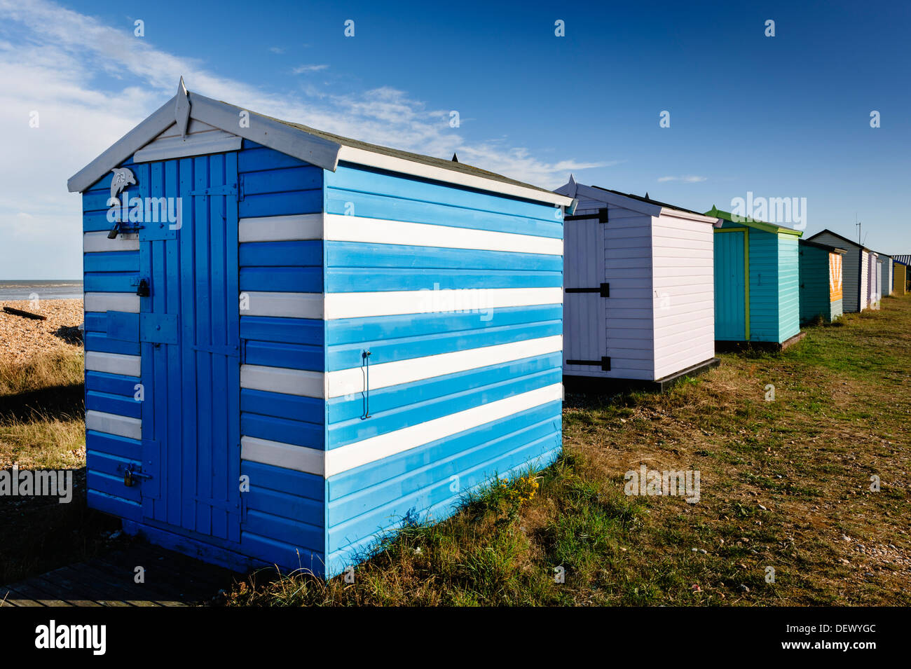 Stripy blue beach huts hi-res stock photography and images - Alamy