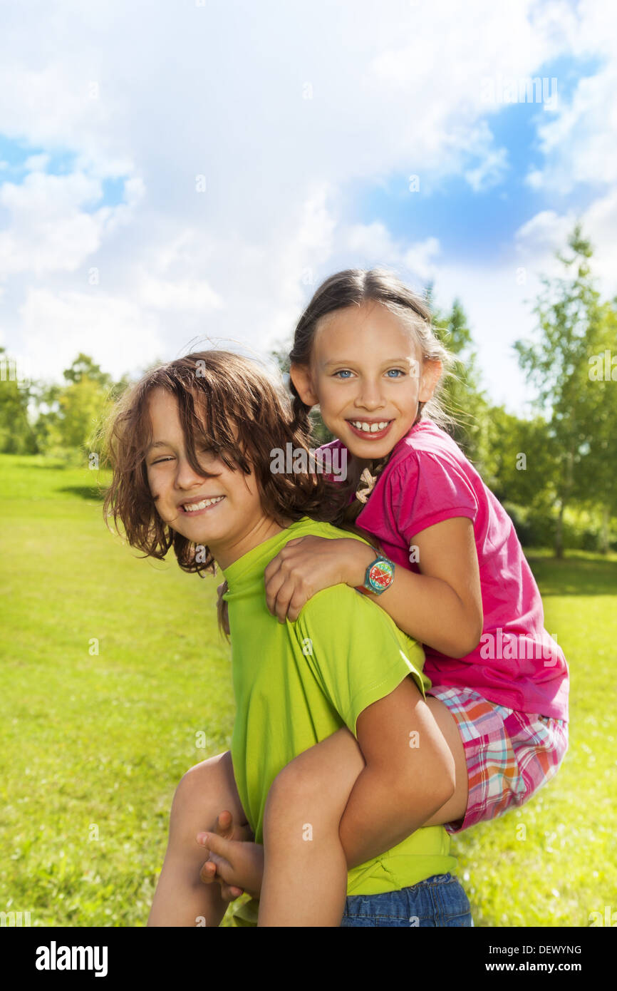 Carry child couple fun girl hi-res stock photography and images - Alamy
