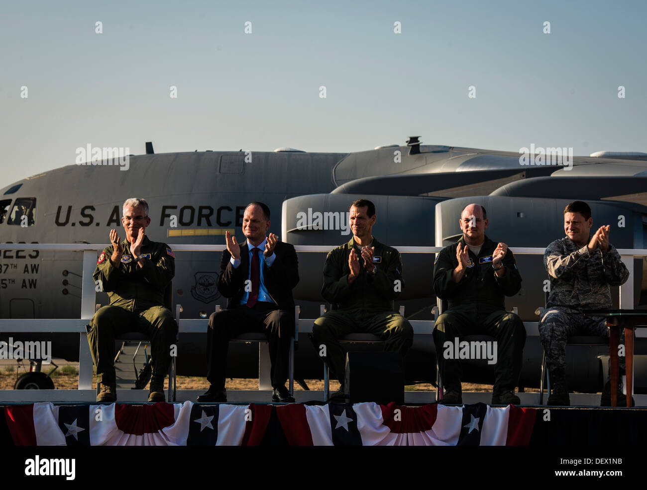 U.S. Air Force leaders and a distinguished guest applaud during a ...
