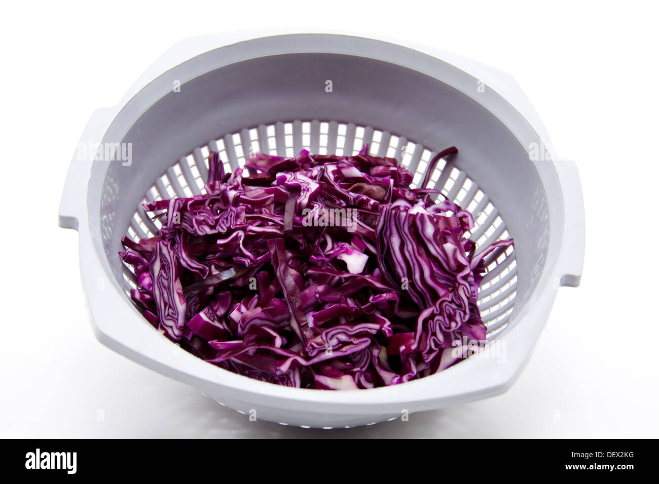 Fresh red cabbage in the kitchen sieve Stock Photo - Alamy
