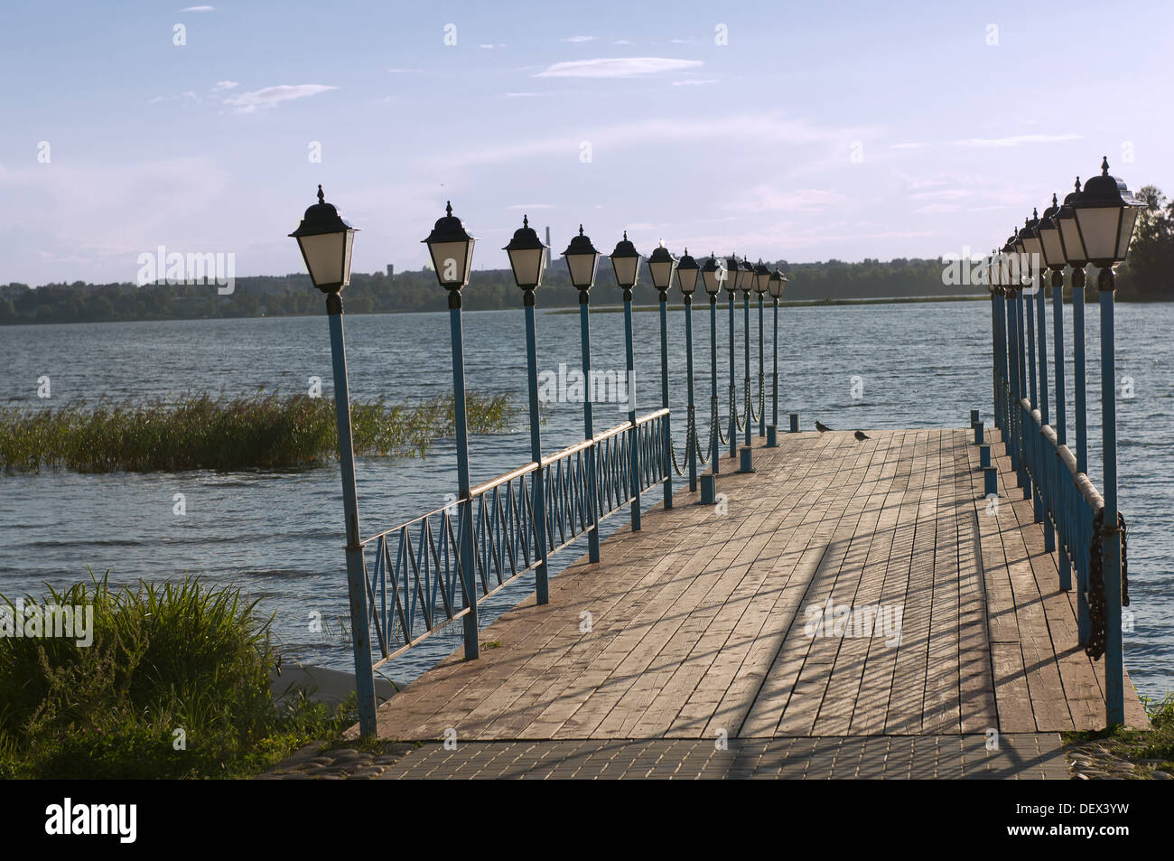 Long wooden dock leading into water hi-res stock photography and images ...
