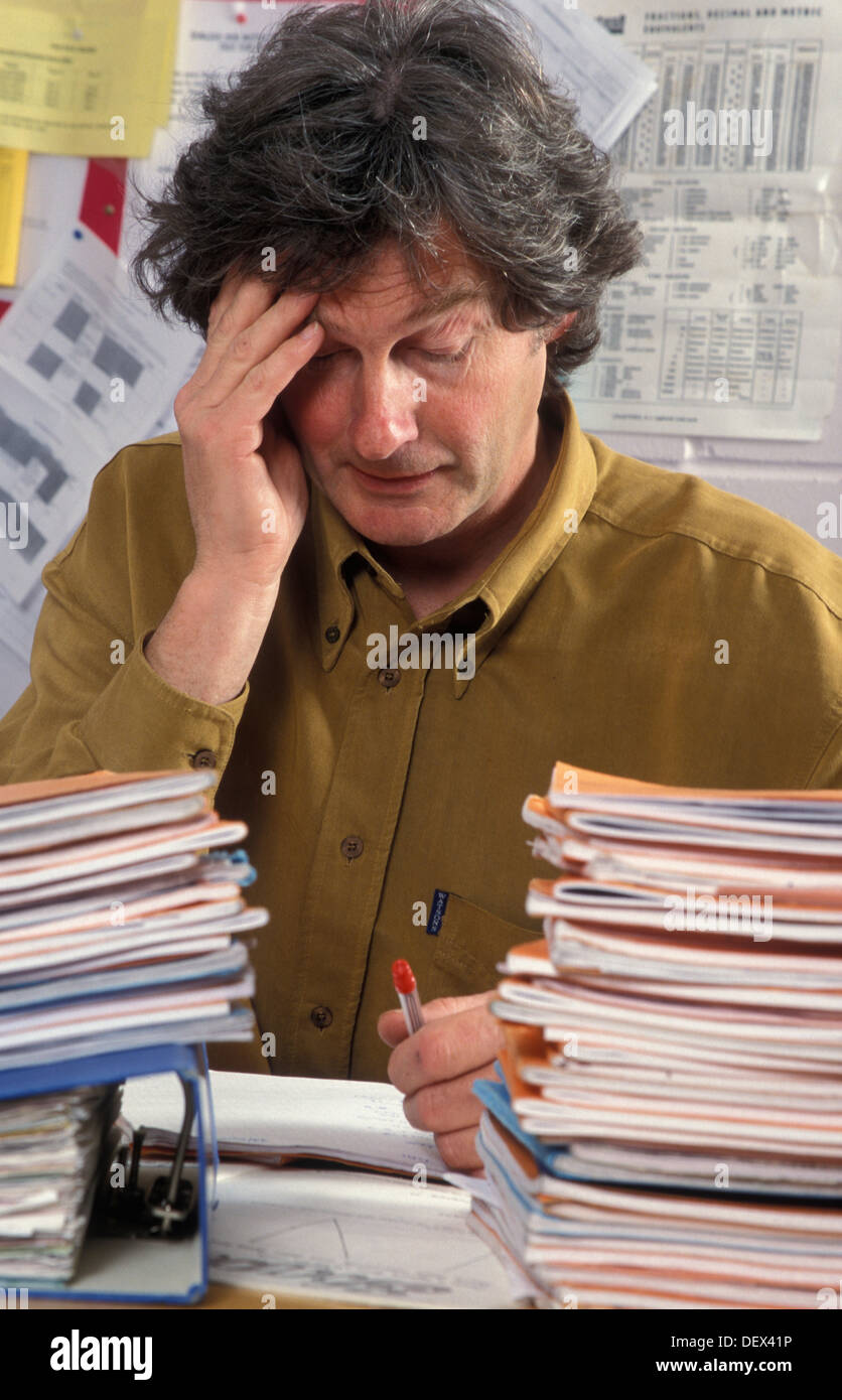 Teacher marking books hi-res stock photography and images - Alamy