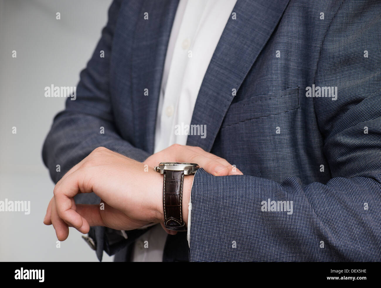 Work look at watch hi-res stock photography and images - Alamy