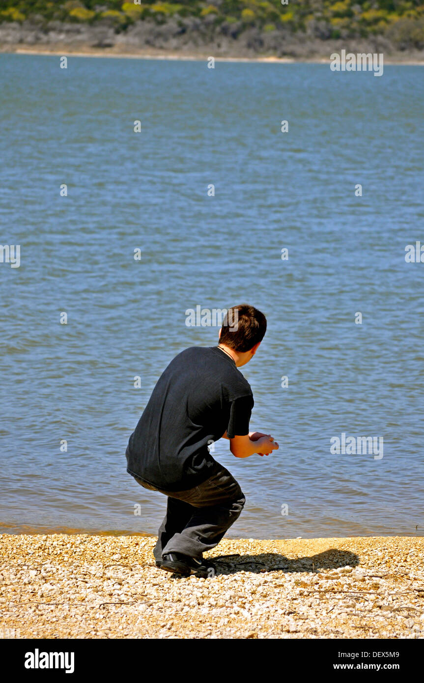 Man skipping rocks hi-res stock photography and images - Alamy