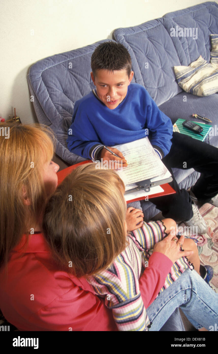 Family interview at home hi-res stock photography and images - Alamy